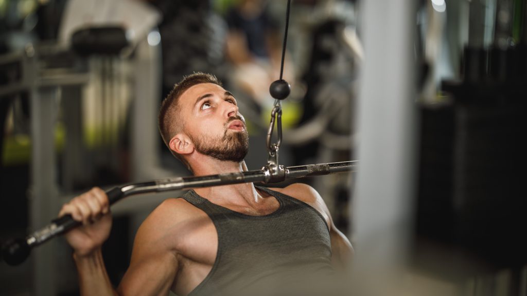 How to Use a Lateral Pull-Down Machine | The Hussle Blog
